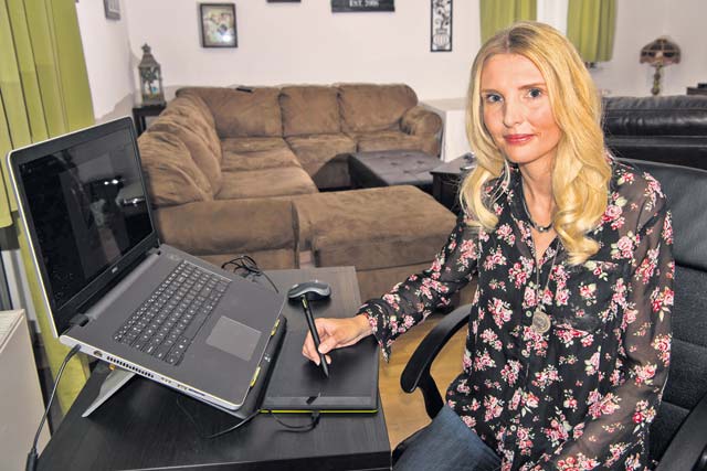 KMC spouse wins CPI office logo contest - Kaiserslautern American